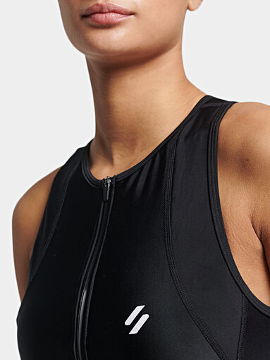 One-piece sports swimsuit with zipper brand SUPERDRY ...