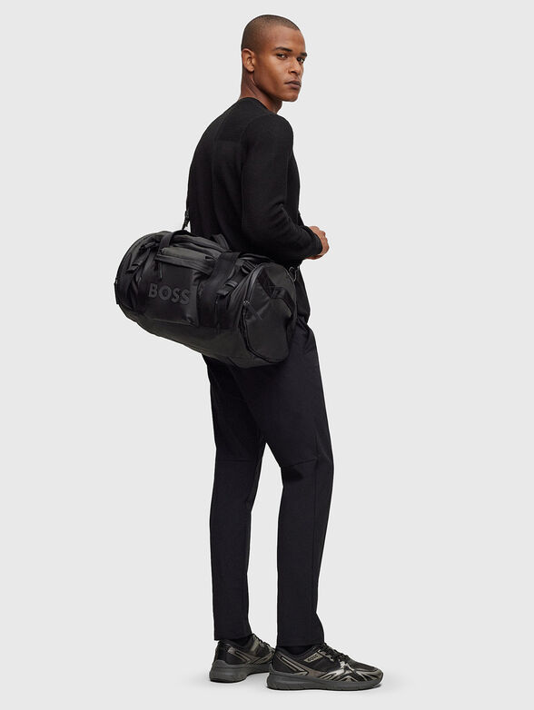 Black holdall with logo brand BOSS — Globalbrandsstore.com/en