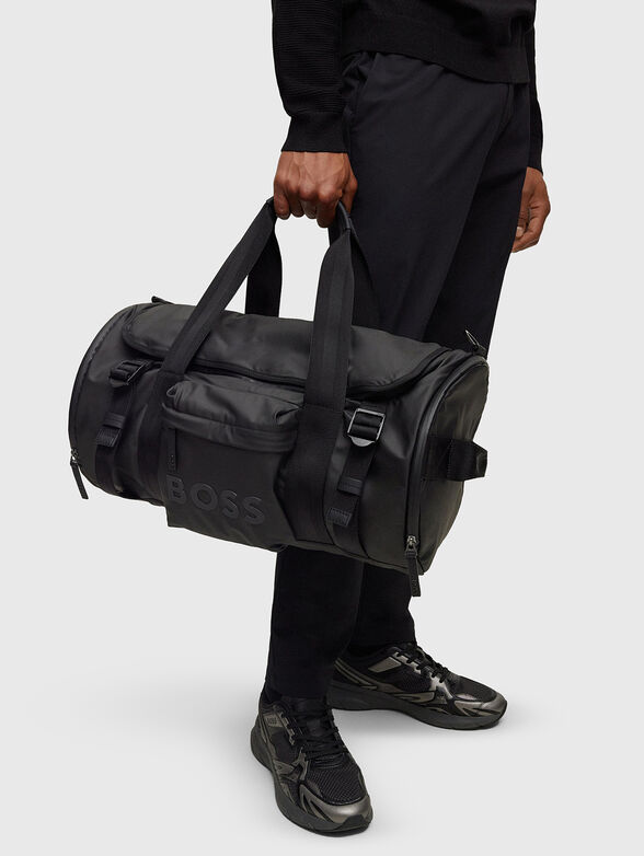 Black holdall with logo brand BOSS — Globalbrandsstore.com/en