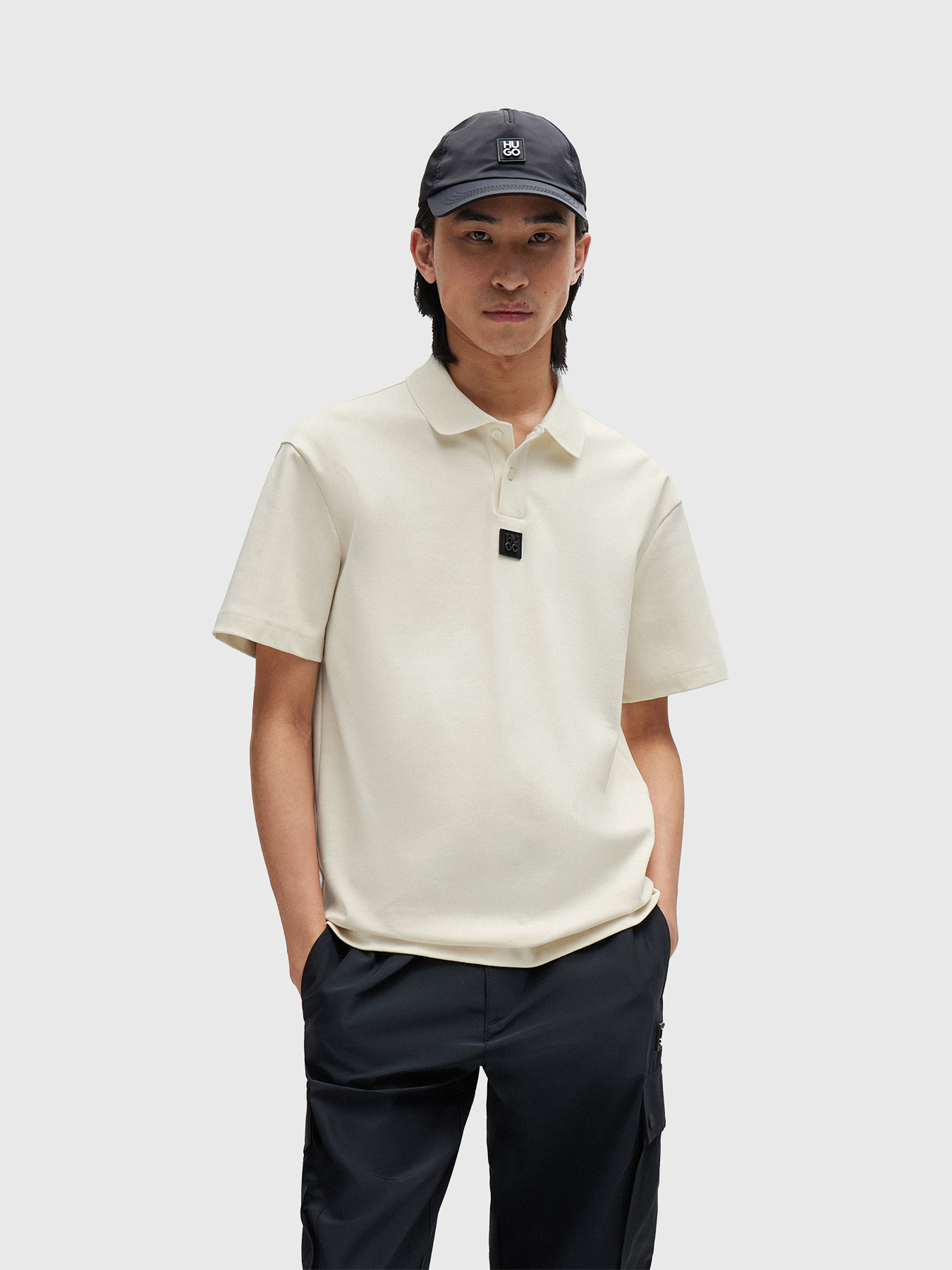 DEABONO black cotton polo shirt with logo patch brand HUGO ...